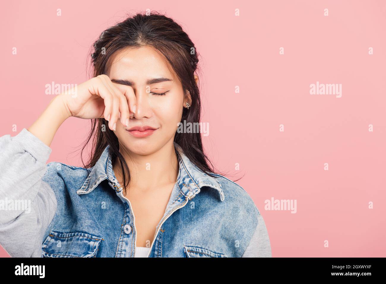 Asian portrait beautiful cute young woman wear denim bad mood her cry ...