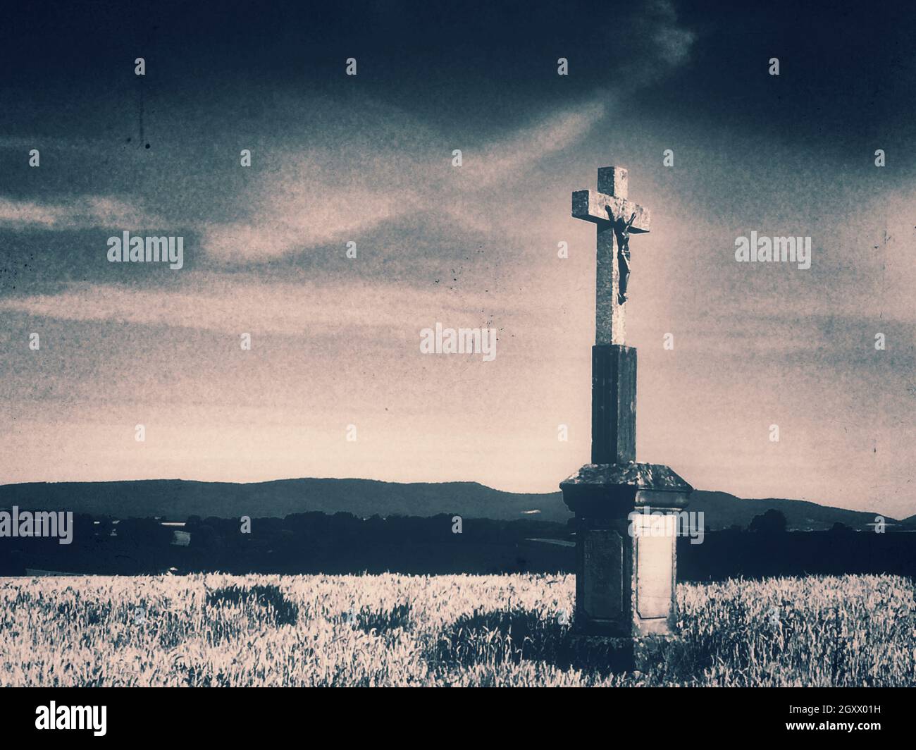 Cross in cornfield in retro style Stock Photo - Alamy