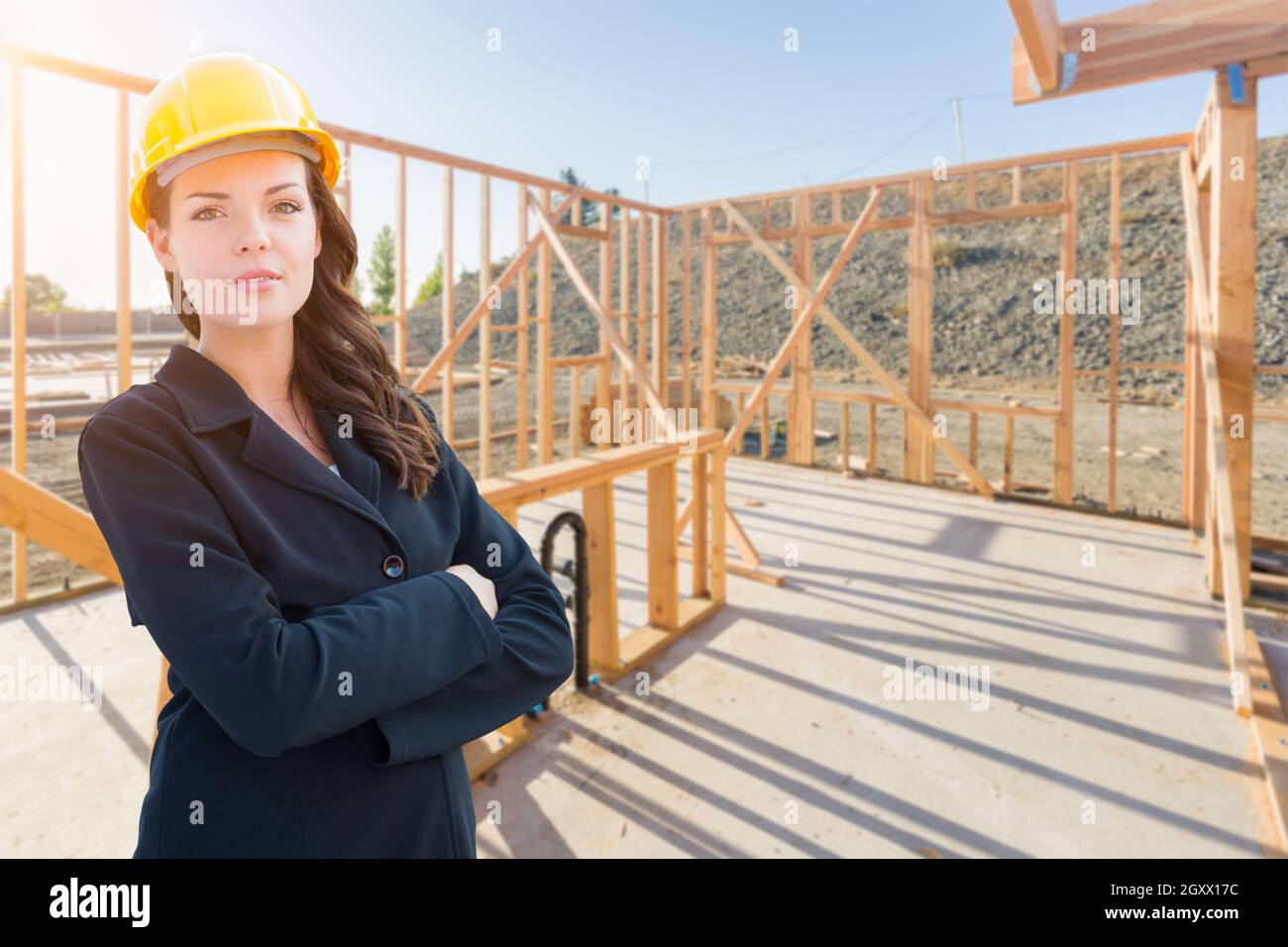 Female Contractor In Hard Hat At Construction Site Stock Photo - Alamy