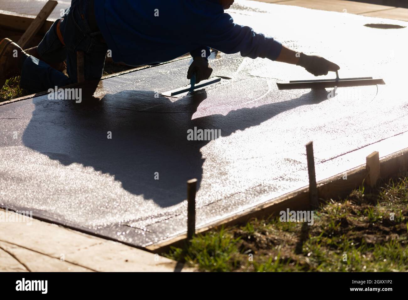 Construction Worker Smoothing Wet Cement With Trowel Tools Stock Photo ...