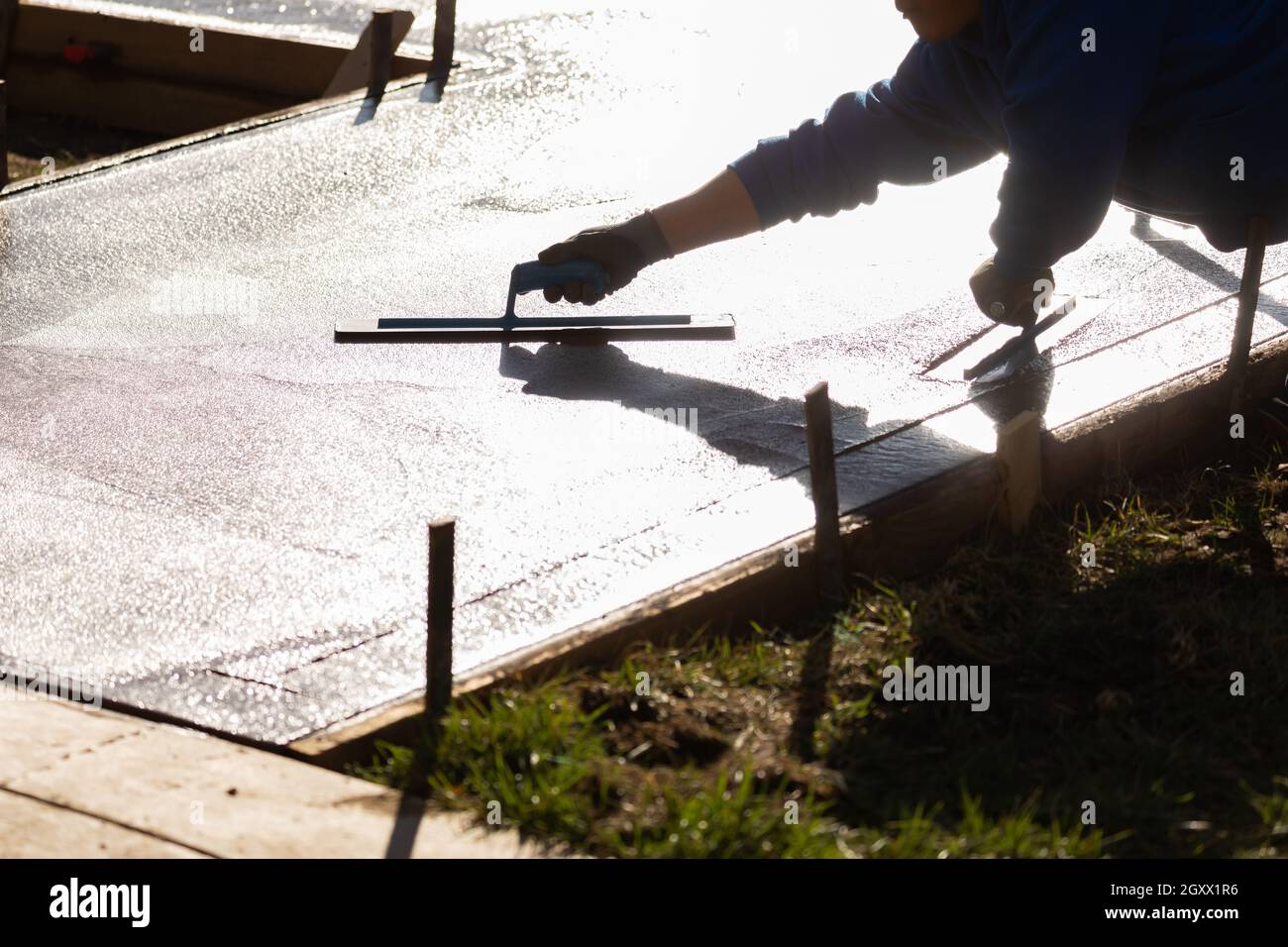 Construction Worker Smoothing Wet Cement With Trowel Tools Stock Photo ...