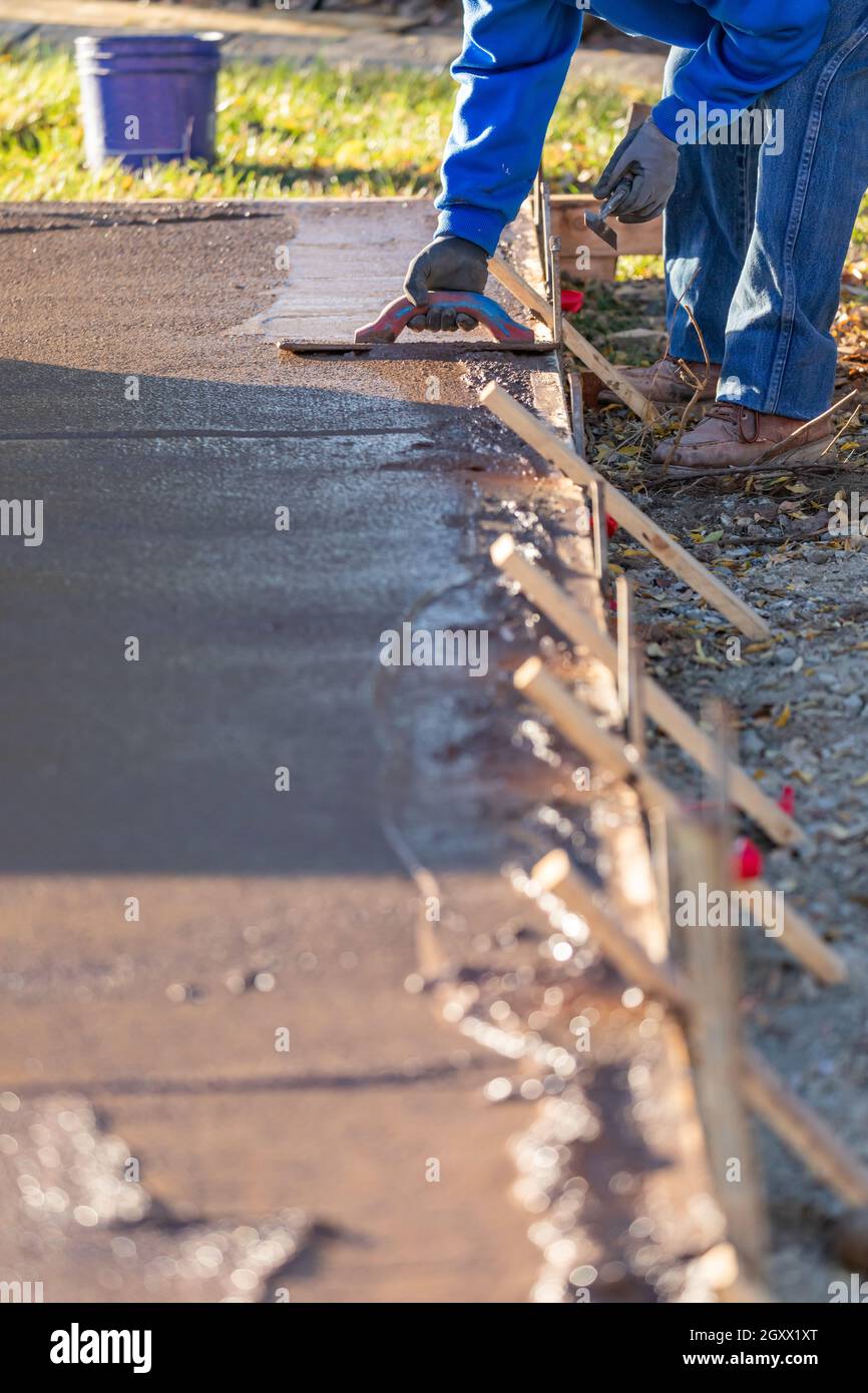 Construction Worker Smoothing Wet Cement With Trowel Tools Stock Photo ...