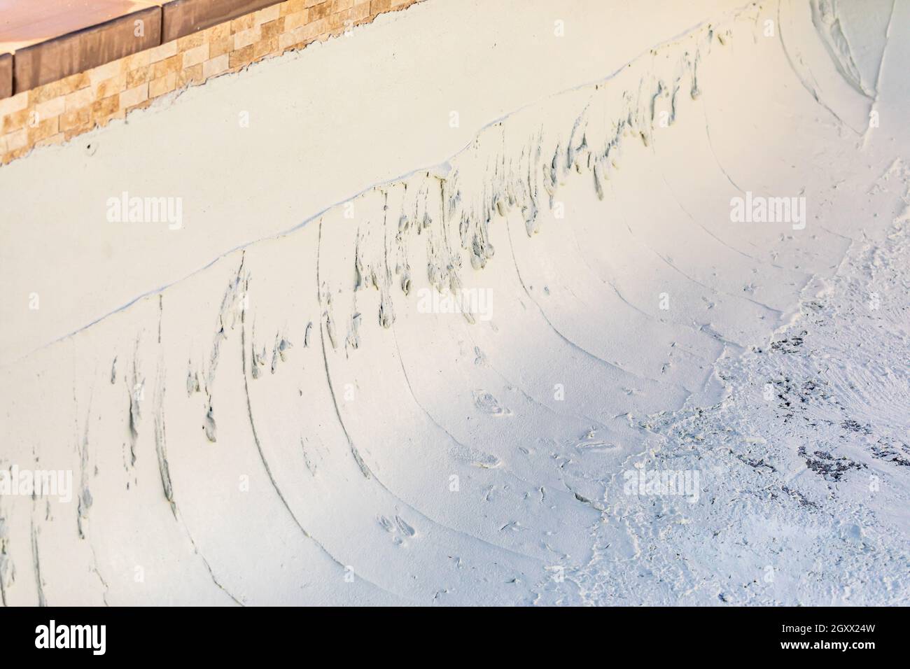 Freshly Applied Wet Pool Plaster During Build Stock Photo - Alamy