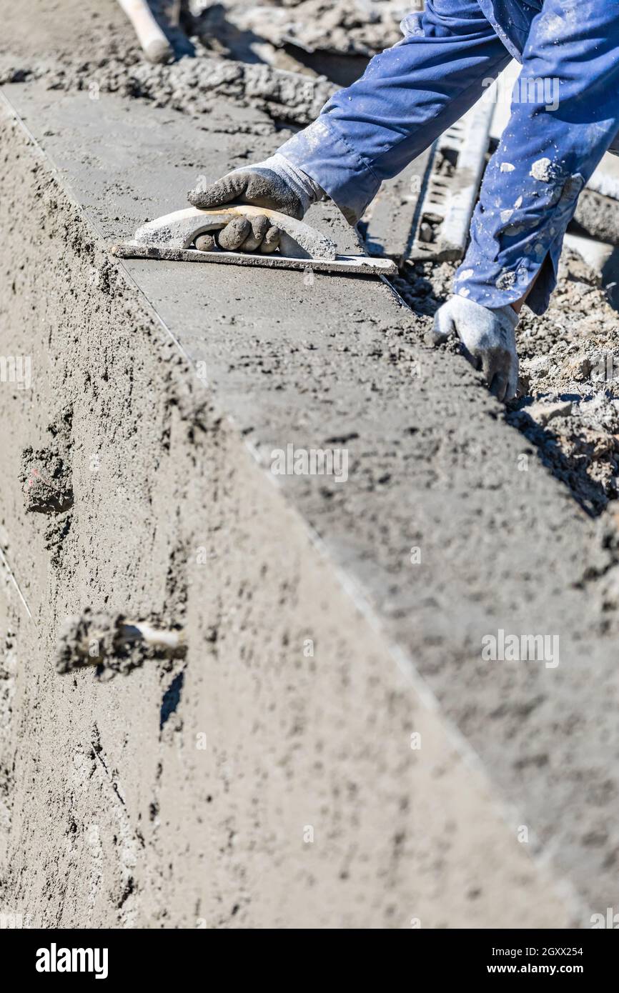 Pool Construction Worker Working With Wood Float On Wet Concrete Stock ...