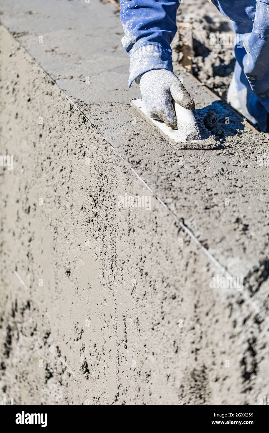 Pool Construction Worker Working With Wood Float On Wet Concrete Stock ...