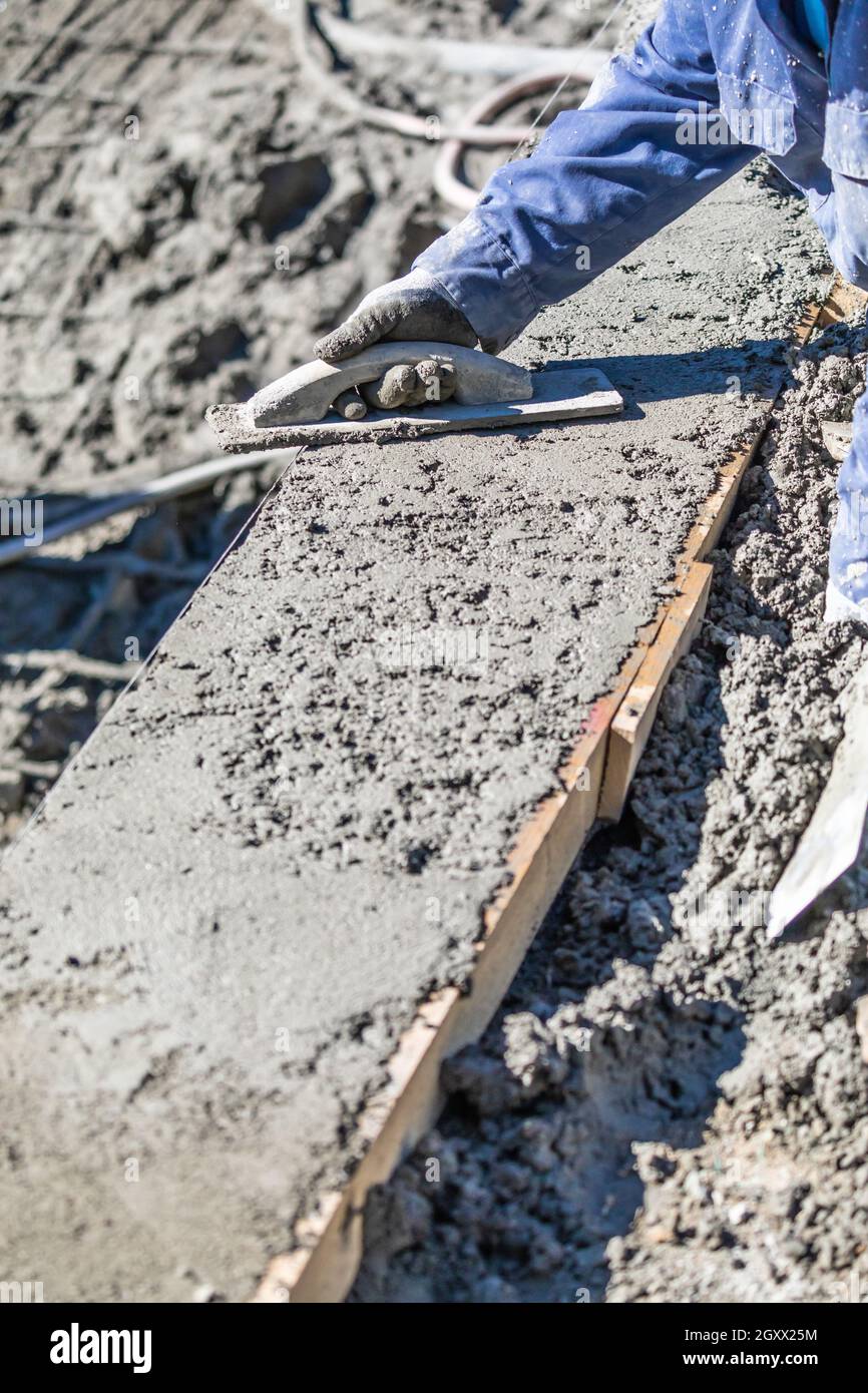 Pool Construction Worker Working With Wood Float On Wet Concrete Stock ...