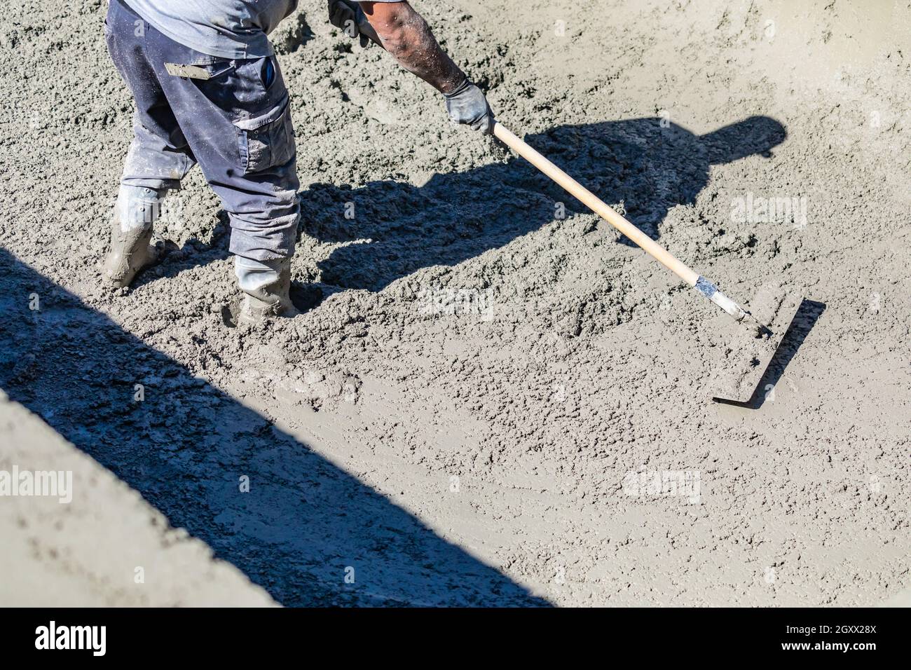 Pool Construction Worker Working With A Bullfloat On Wet Concrete Stock ...