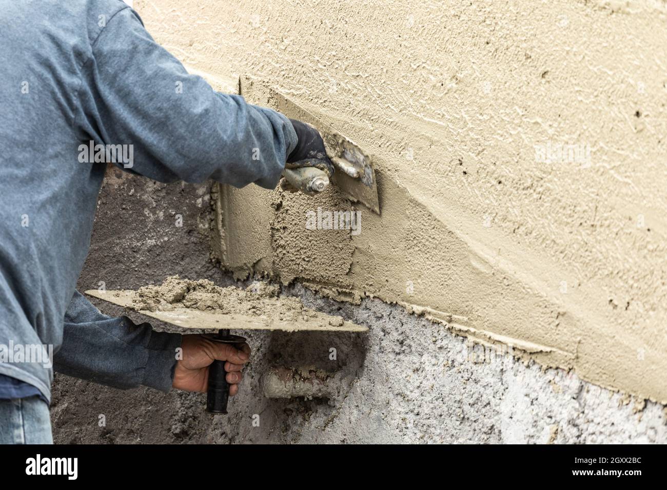 Tile Worker Applying Cement with Trowel at Pool Construction Site Stock ...