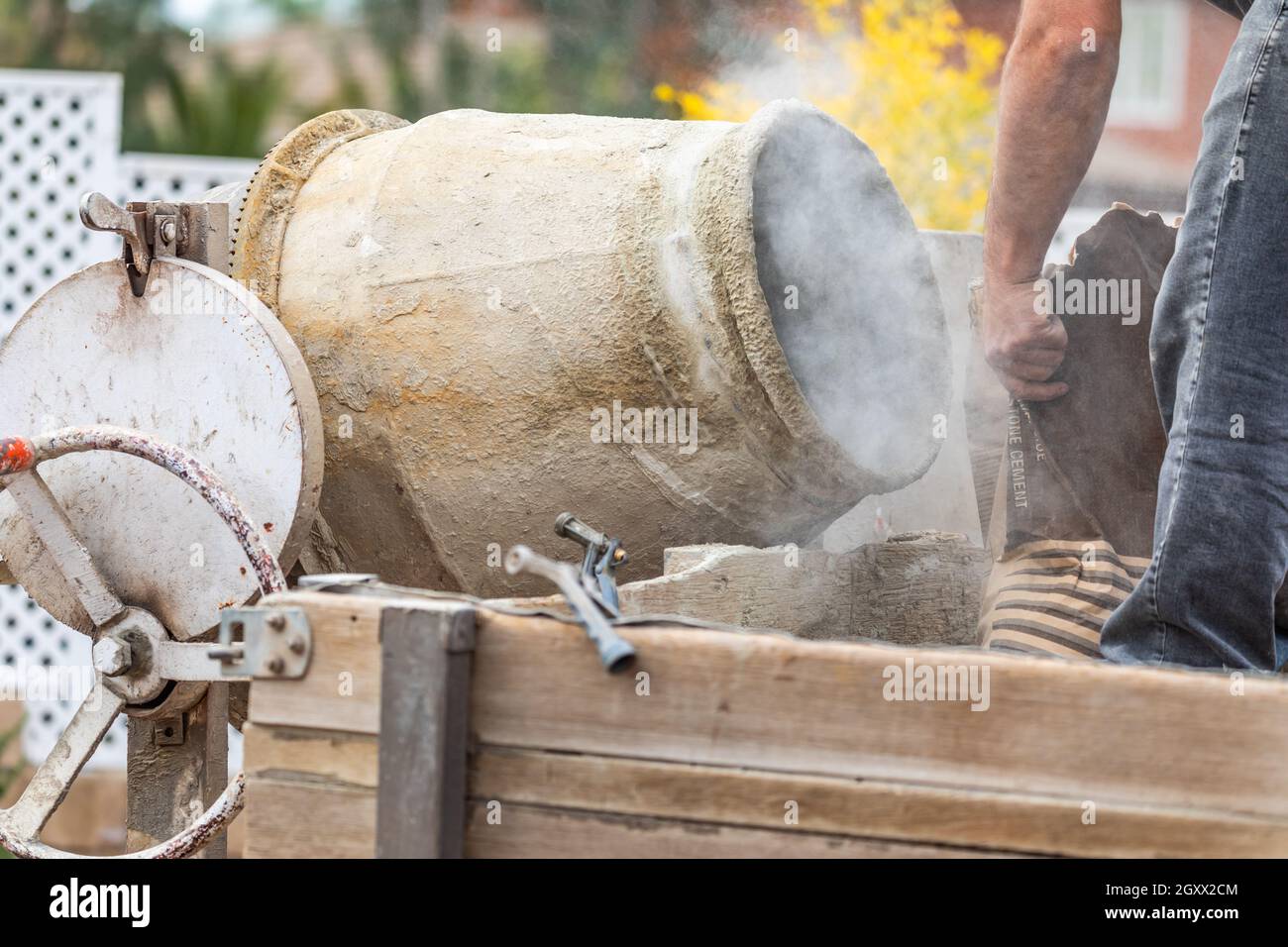 Construciton Worker Mixing Cement At Construction Site Stock Photo - Alamy