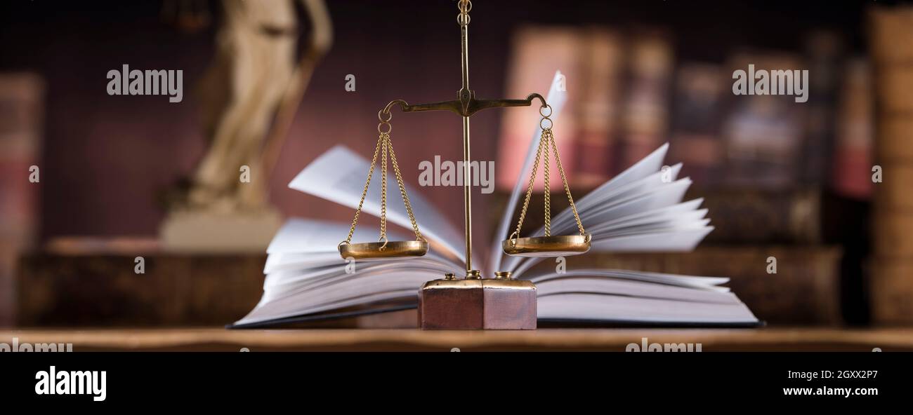 Scales, books of justice concept Stock Photo - Alamy
