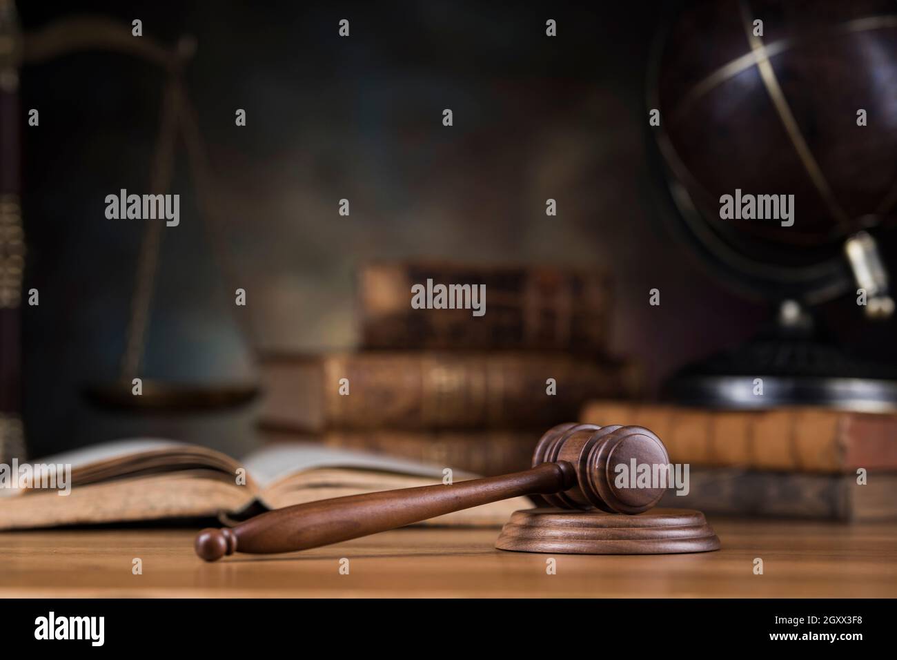 Law theme, mallet of judge, wooden gavel, globe background Stock Photo ...