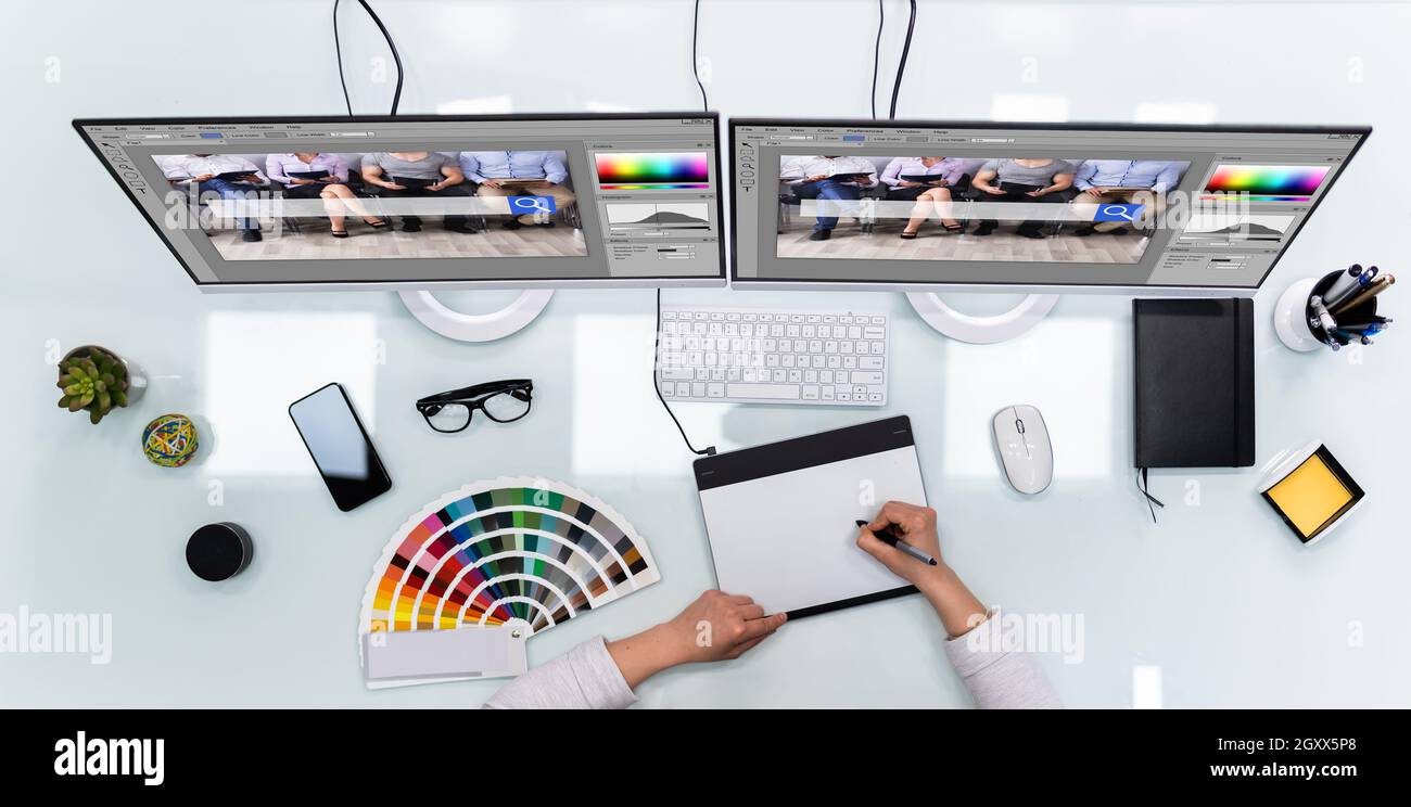 Graphic Web Designer Using Multiple Monitors Desktop Computer Stock ...