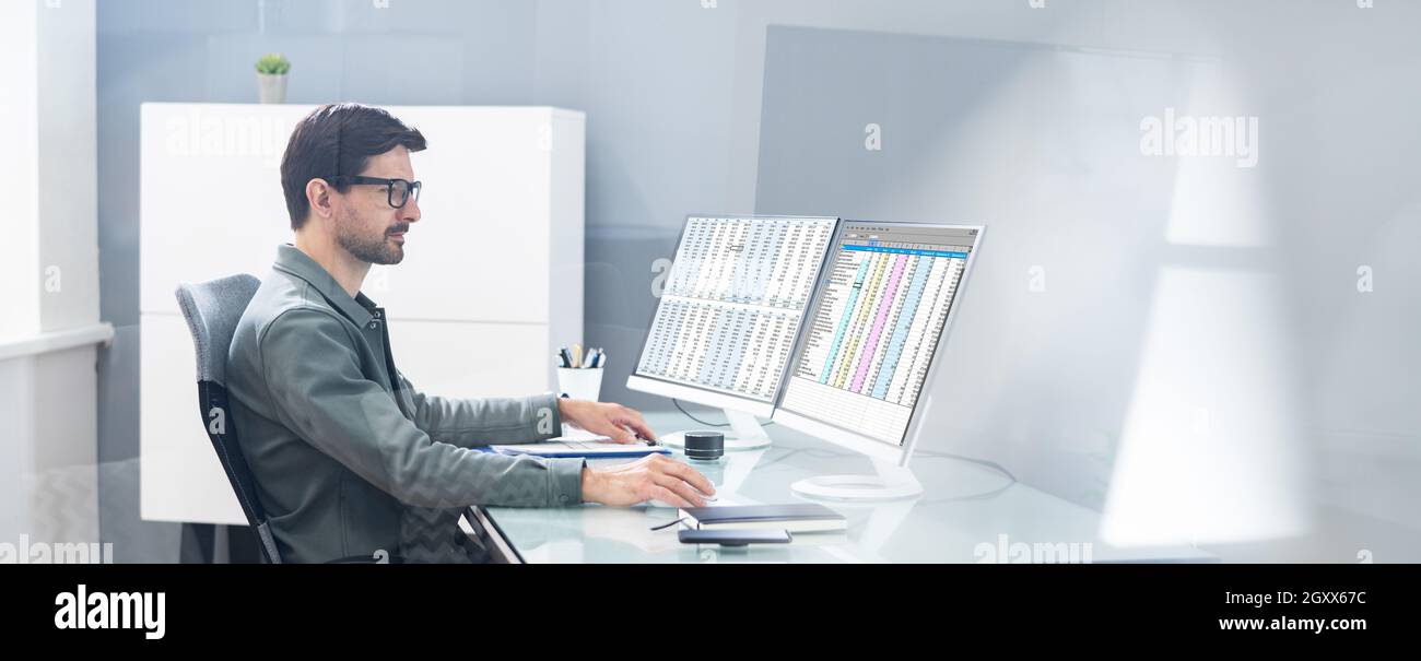 Auditor Spreadsheet Report On Desktop Computer Screen Stock Photo - Alamy