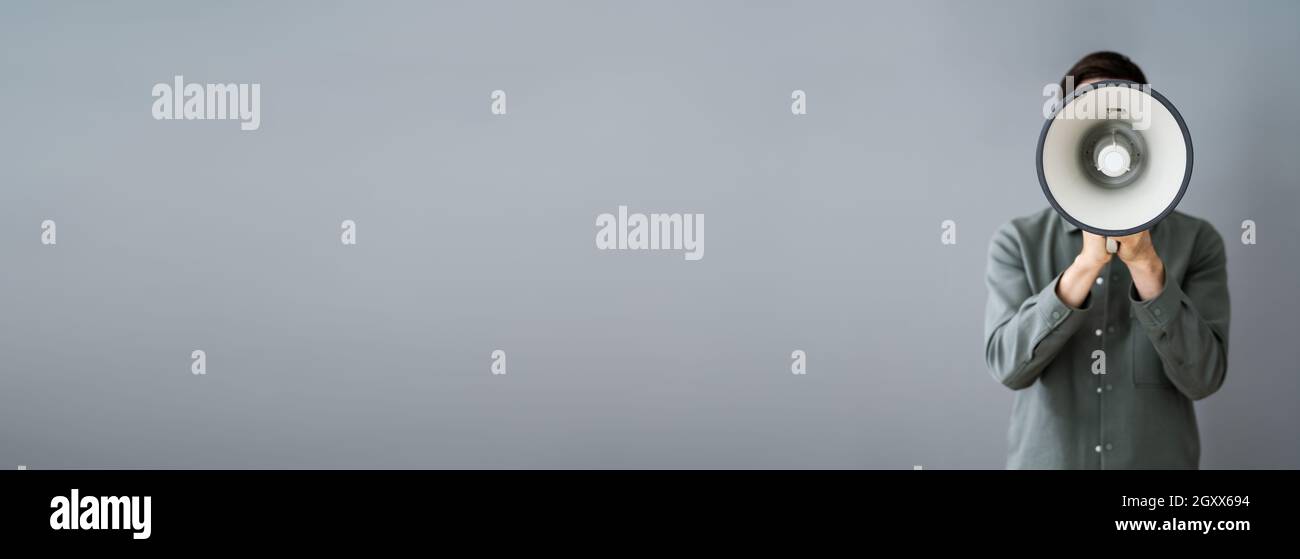 Man holding microphone announcement hi-res stock photography and images ...