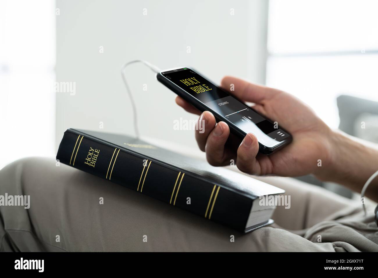 Preacher Listening Bible On Phone. Praying With Headphones Stock Photo ...