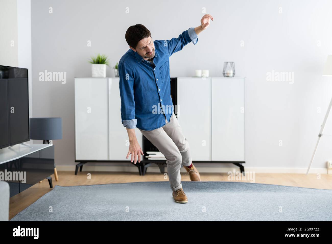 Man in bin on floor hi-res stock photography and images - Alamy