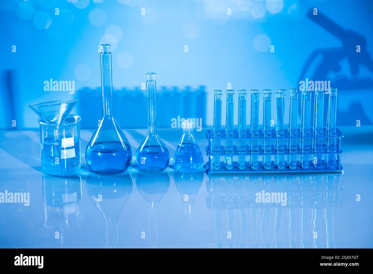 Laboratory equipment, glass filled background Stock Photo - Alamy