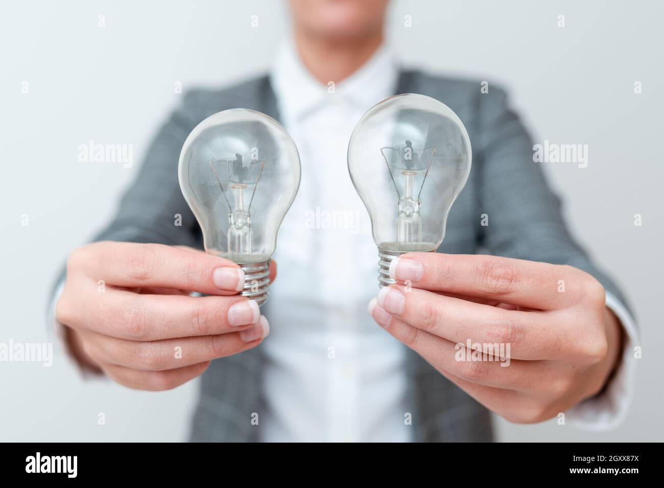 Women holding lamps hi-res stock photography and images - Alamy