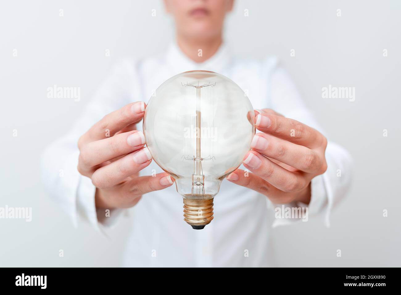 Lady Holding Lamp With Formal Outfit Presenting New Ideas For Project ...
