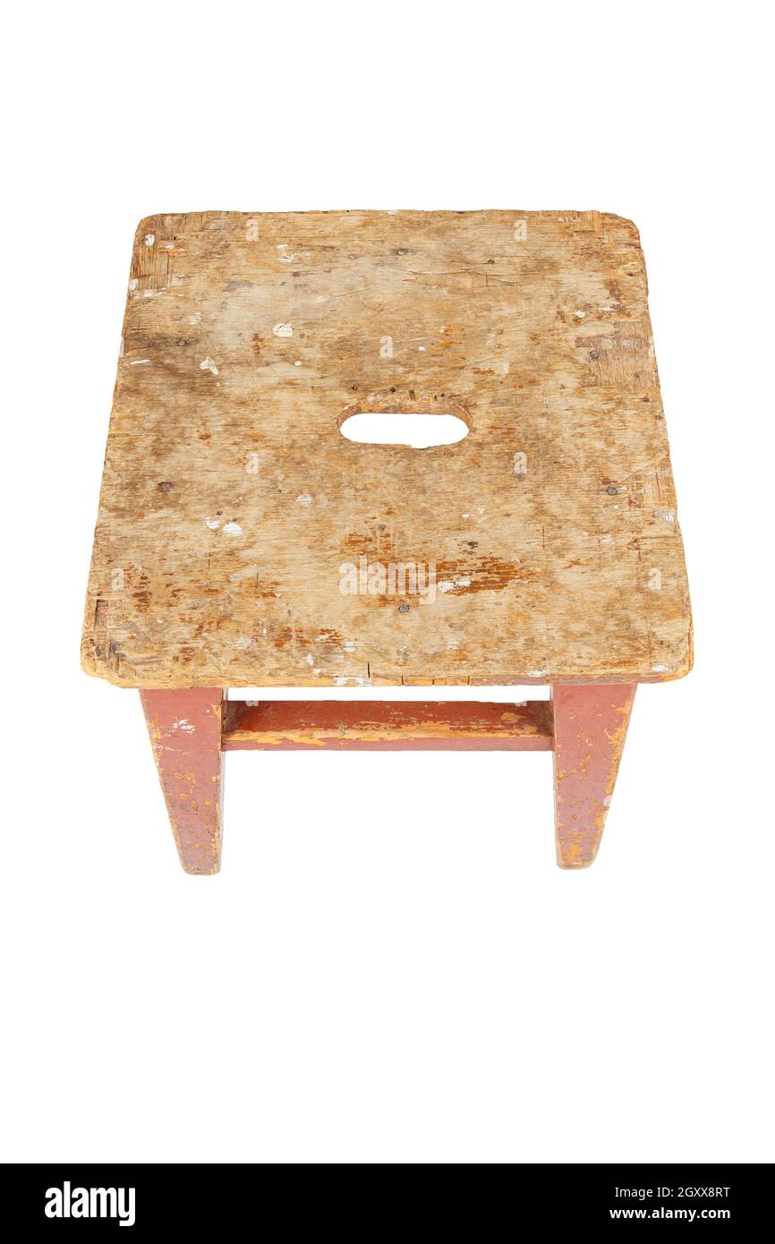Old wooden stool with peeling brown paint. Loft style chair isolated on ...