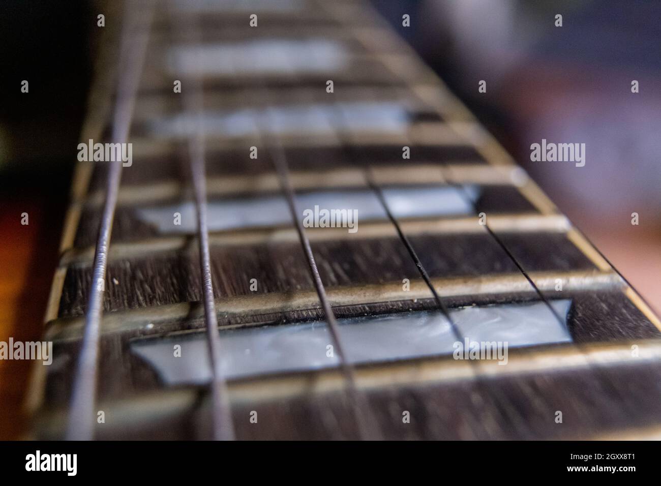 Arm, strings, and frets of classic electric guitar Stock Photo - Alamy