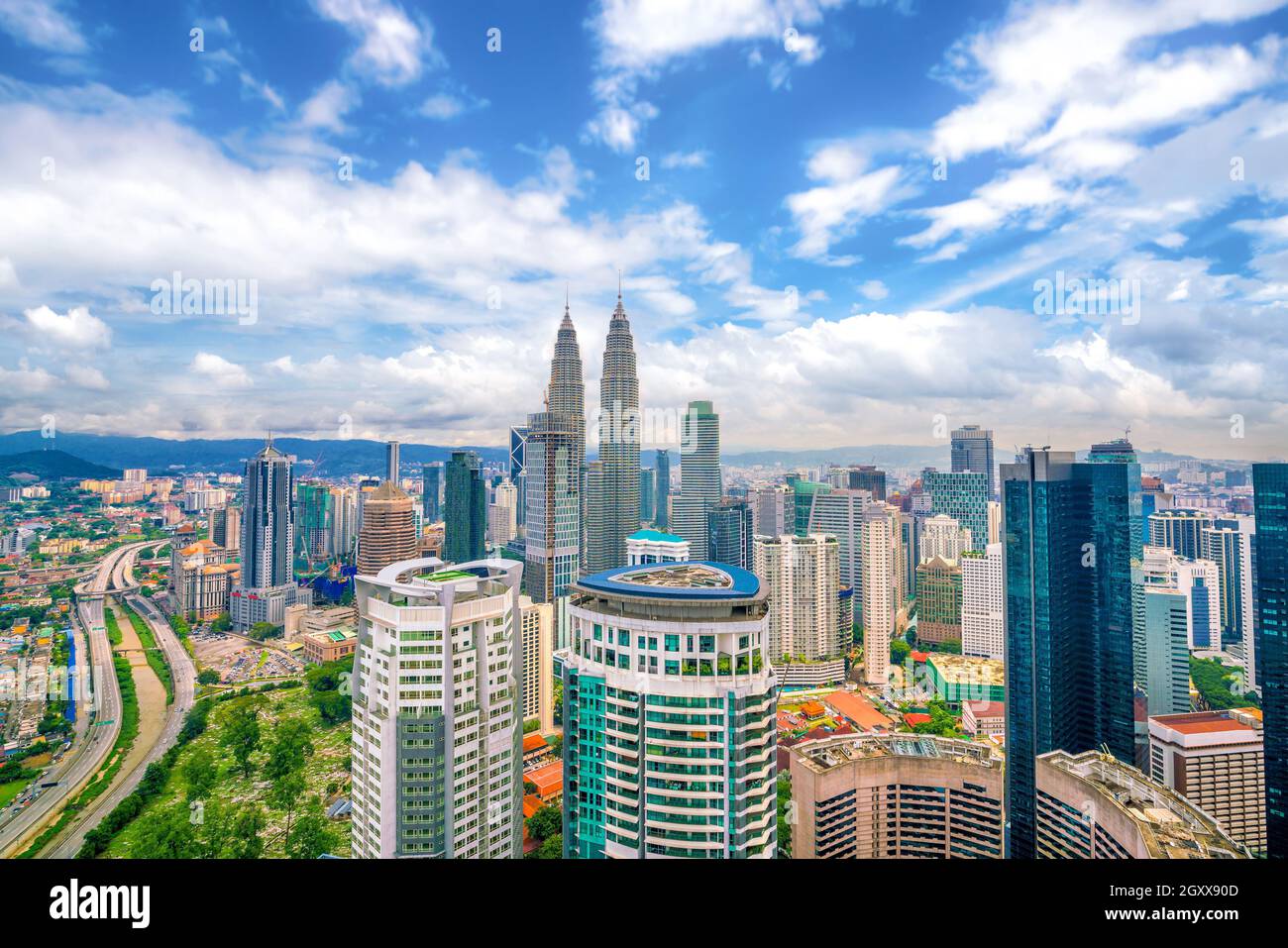 Downtown Kuala Lumpur skyline with blue sky in Malaysia Stock Photo - Alamy