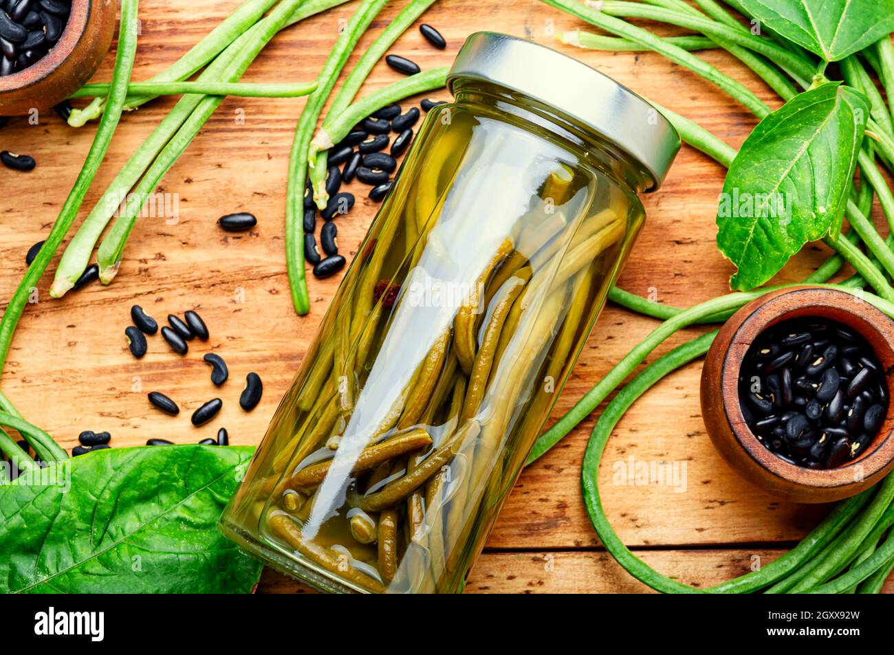 Cowpea pods with beans and a jar of canned cowpea.Vegetable plant Stock ...