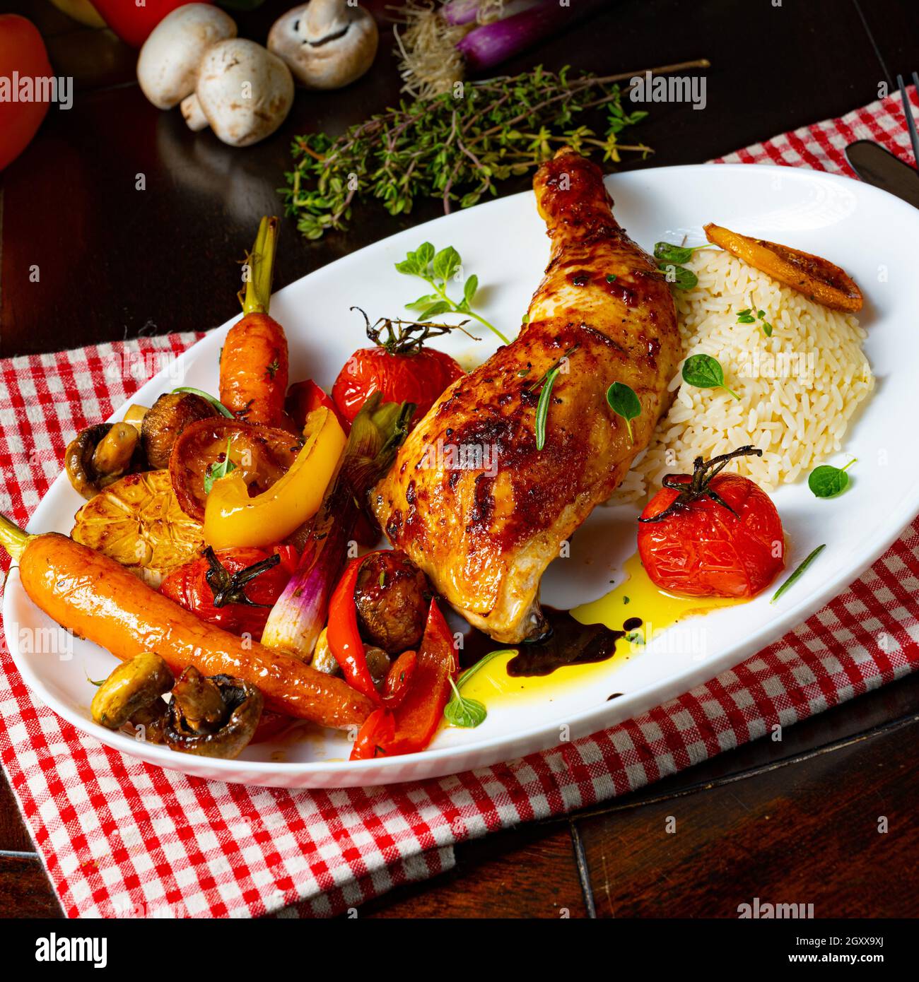 Rustic fried chicken legs with assorted vegetables and rice Stock Photo ...