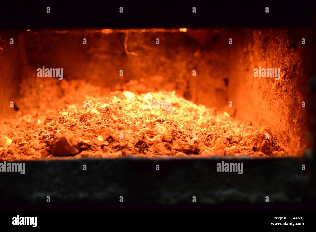 Hot coals in the stove. Red burned by heating the particles tree Stock ...