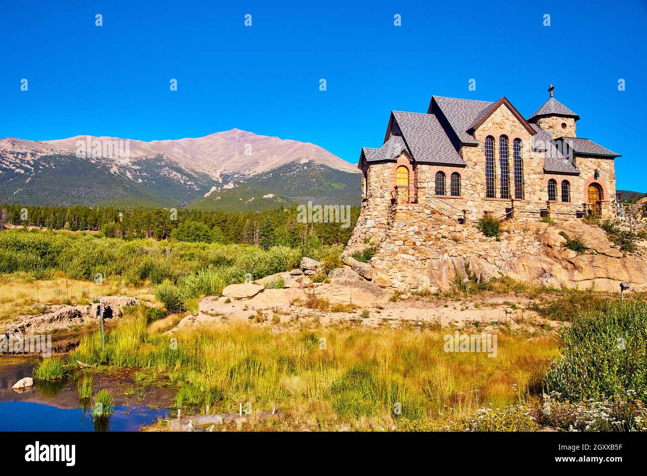 Lone Church isolated in desert mountains by water Stock Photo - Alamy