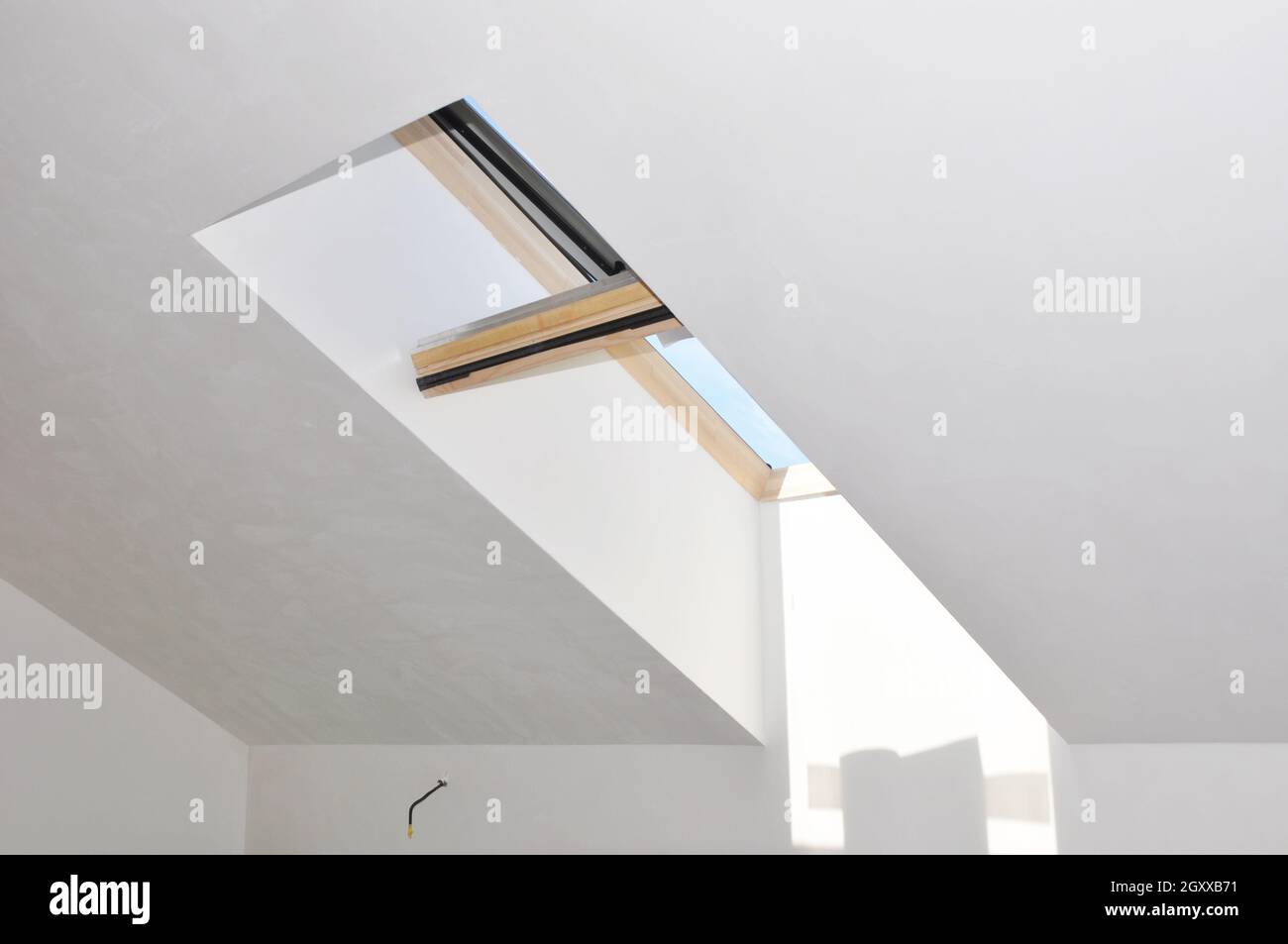 Attic house skylight window after room repair and renovation with ...
