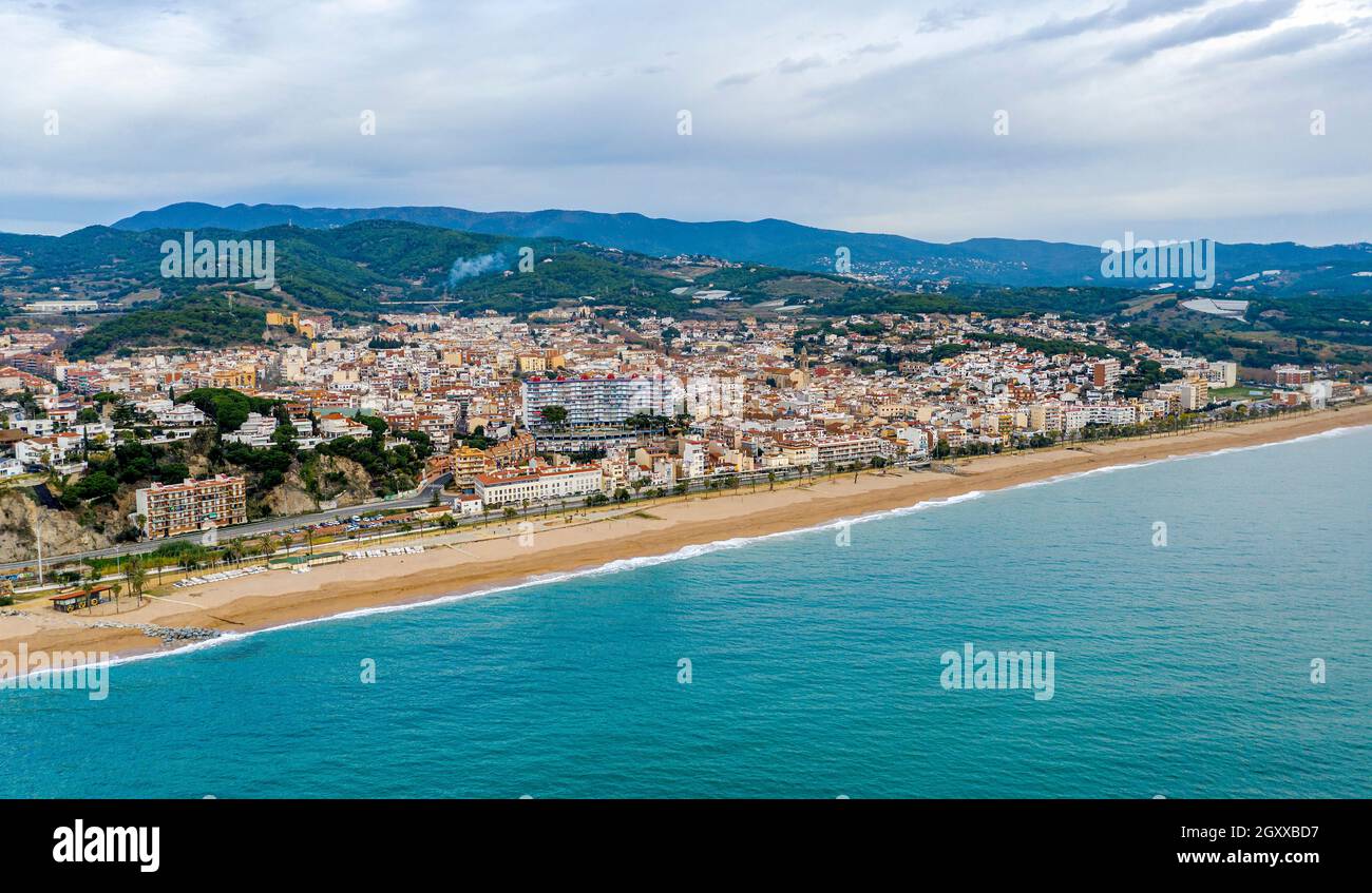 Aerial panoramic view of Canet de Mar city at dawn. Located in El ...