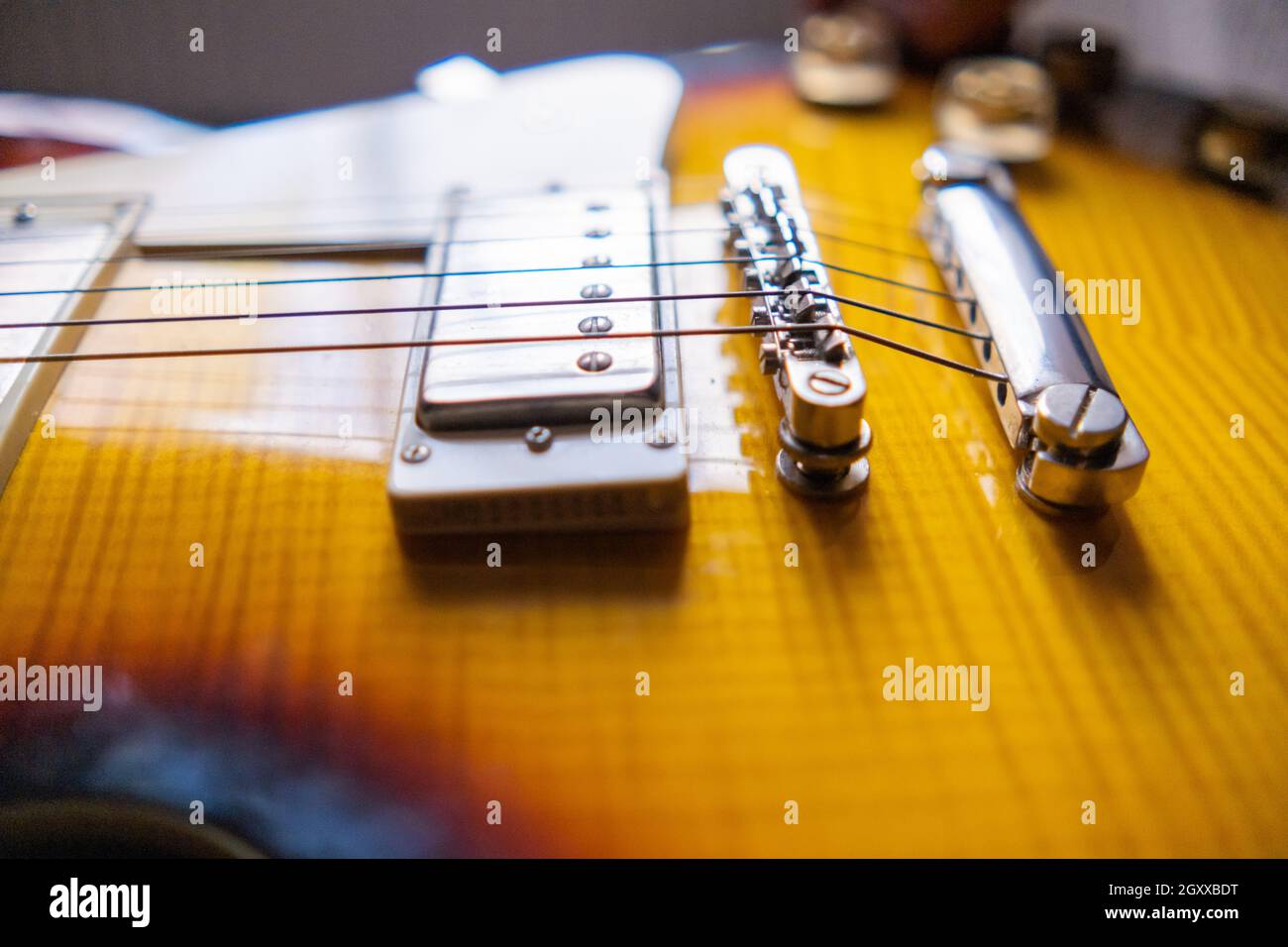 Strings and pickups of classic yellow and black electric guitar Stock ...