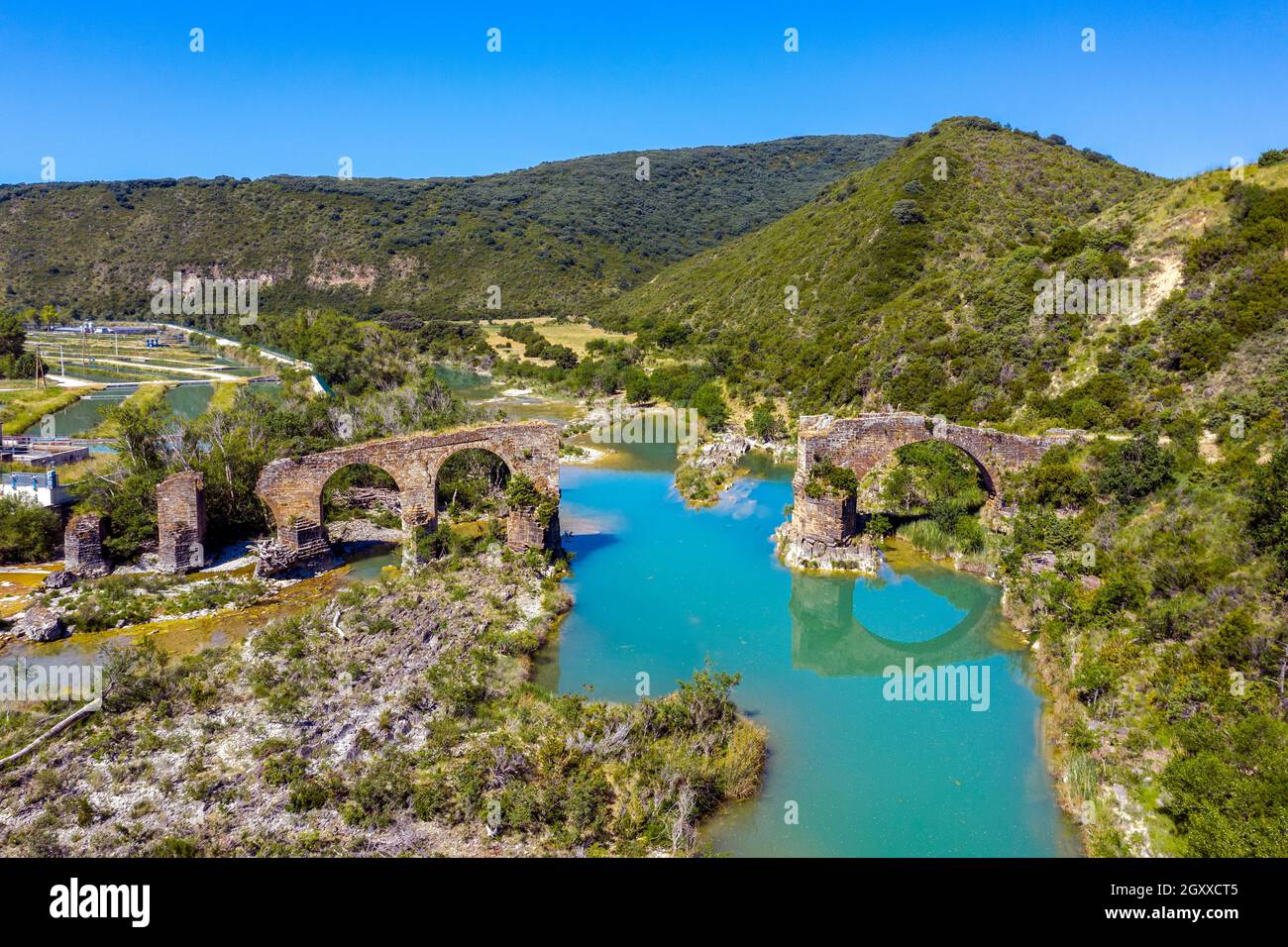 Medieval Roncal bridge of Yesa, which crosses the Aragon river Spain ...