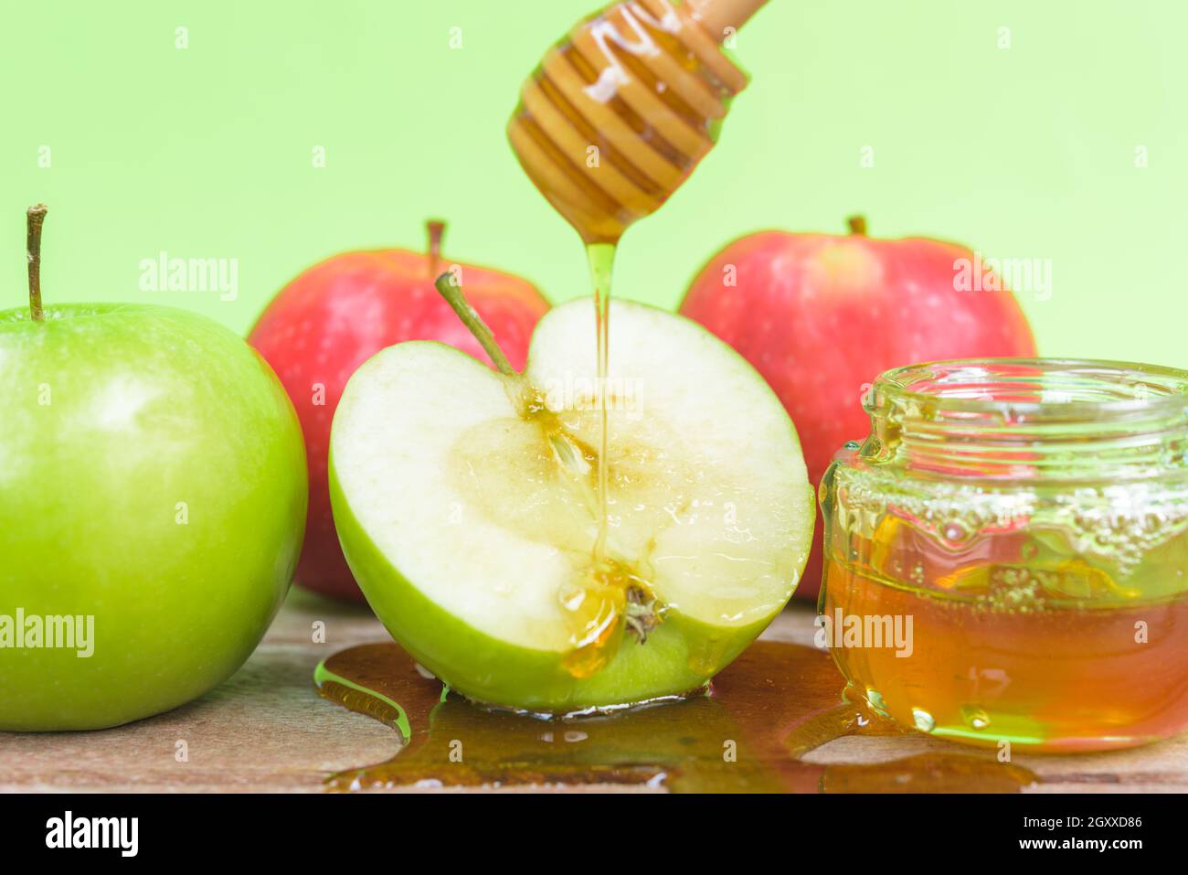 Jewish holiday, Apple Rosh Hashanah, the photo have honey in jar and ...
