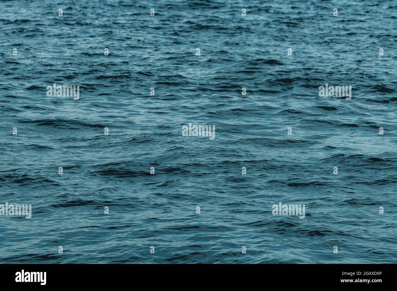 Dark waters, rippled surface of cold Adriatic sea water, selective ...