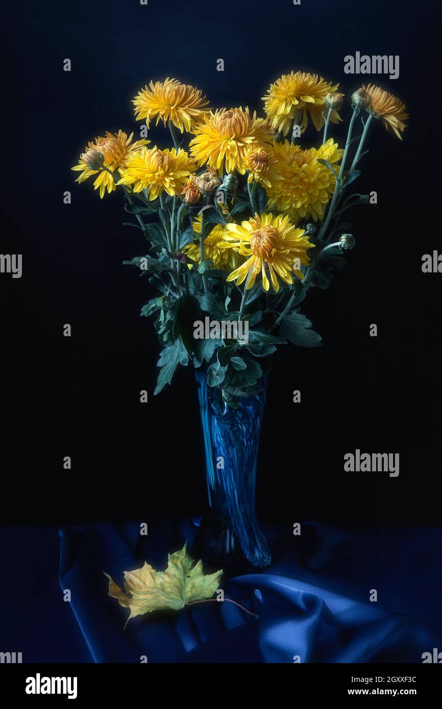 Still life with bouquet of yellow chrysanthemums Stock Photo - Alamy