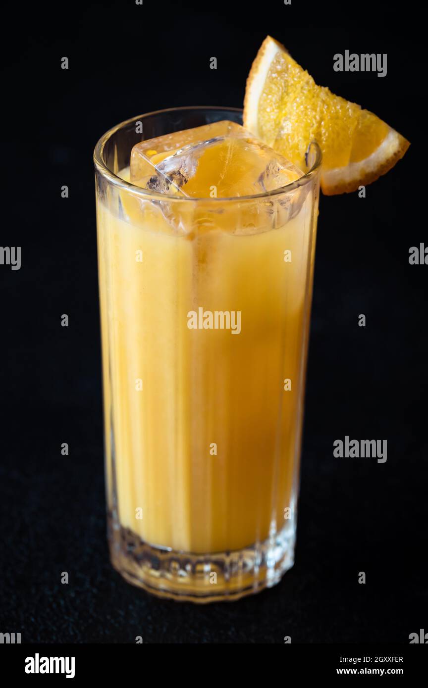 Screwdriver cocktail with orange juice and vodka on black background ...