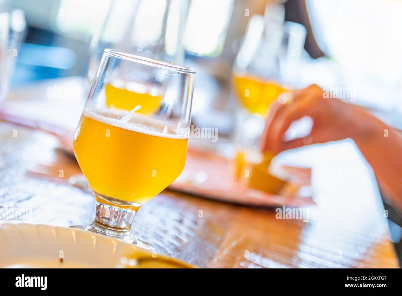 Abstract of Small Glass of Micro Brew Beers On Bar Stock Photo - Alamy