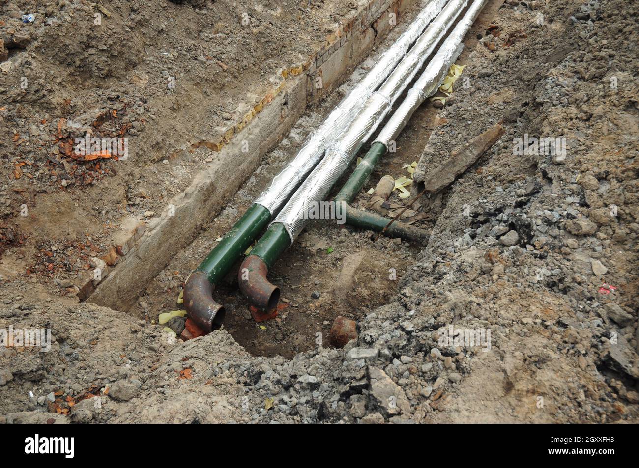 Breakthrough sewerage pipes system. Repair, insulation and replacement ...