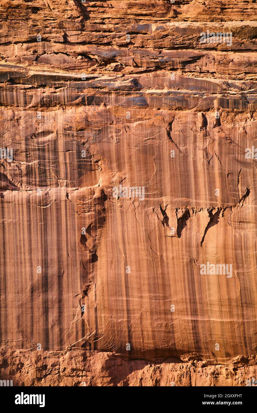 Vertical detail texture shot of stone rock wall with vertical marks ...