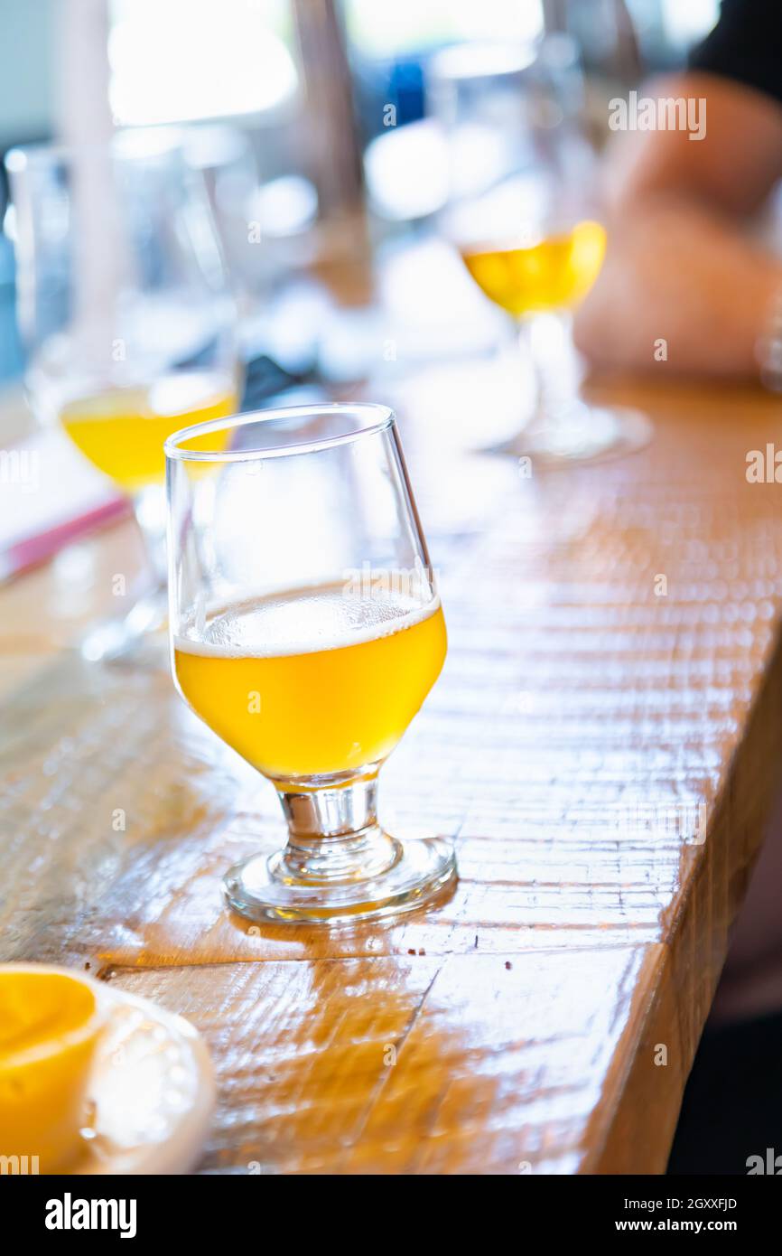 Abstract of Small Glass of Micro Brew Beers On Bar Stock Photo - Alamy