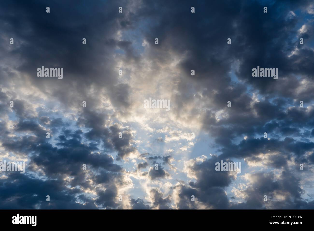 Beautiful clouds of different shapes in the sky before sunset Stock ...