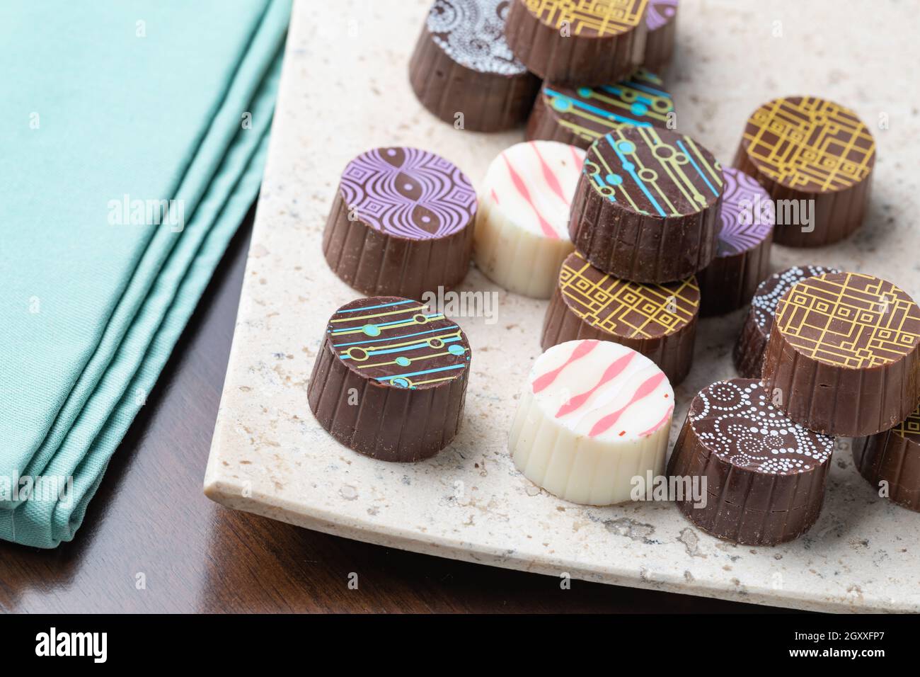 Artisan Fine Chocolate Candy On Serving Dish Stock Photo - Alamy
