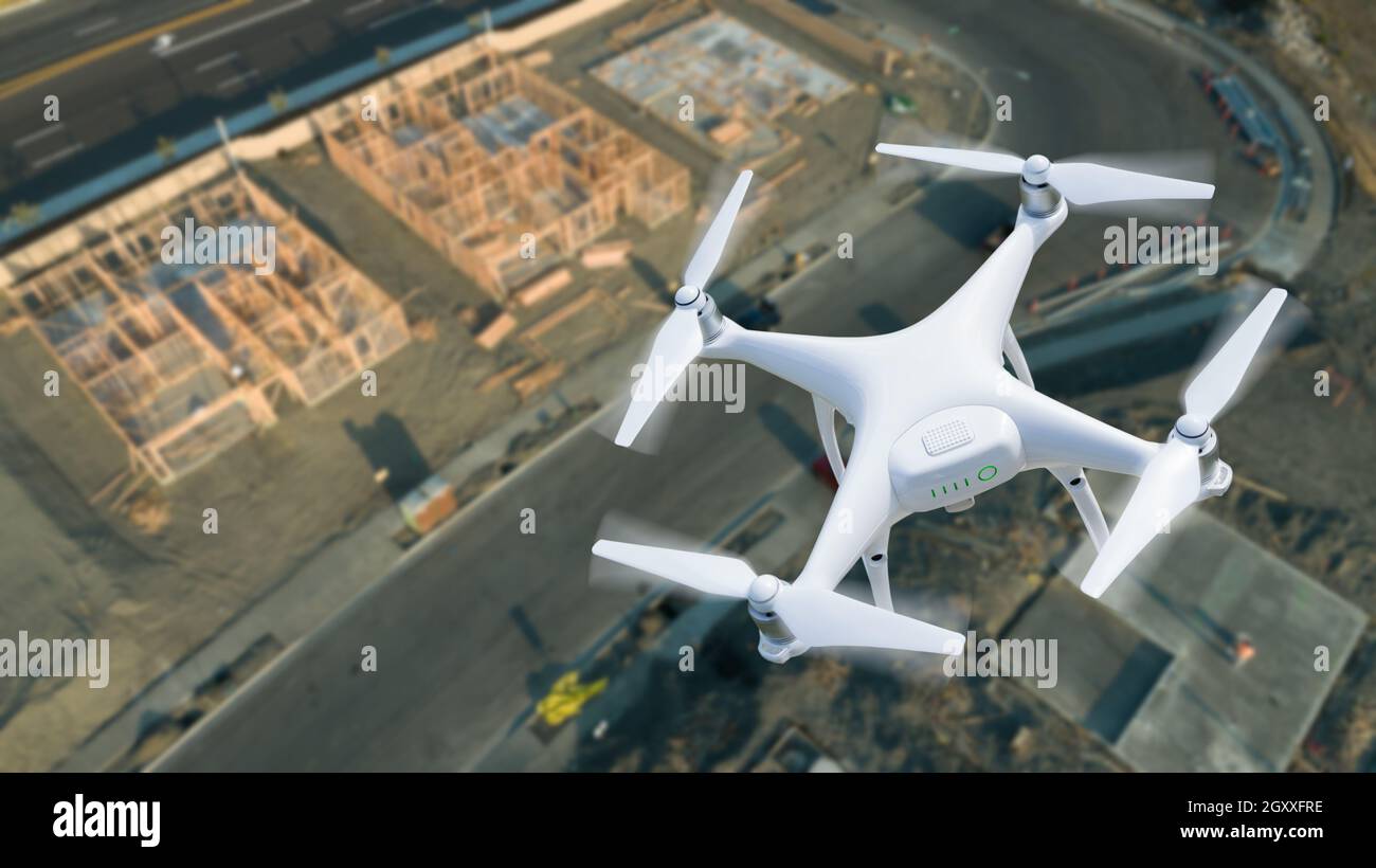 Unmanned Aircraft System (UAV) Quadcopter Drone In The Air Over ...