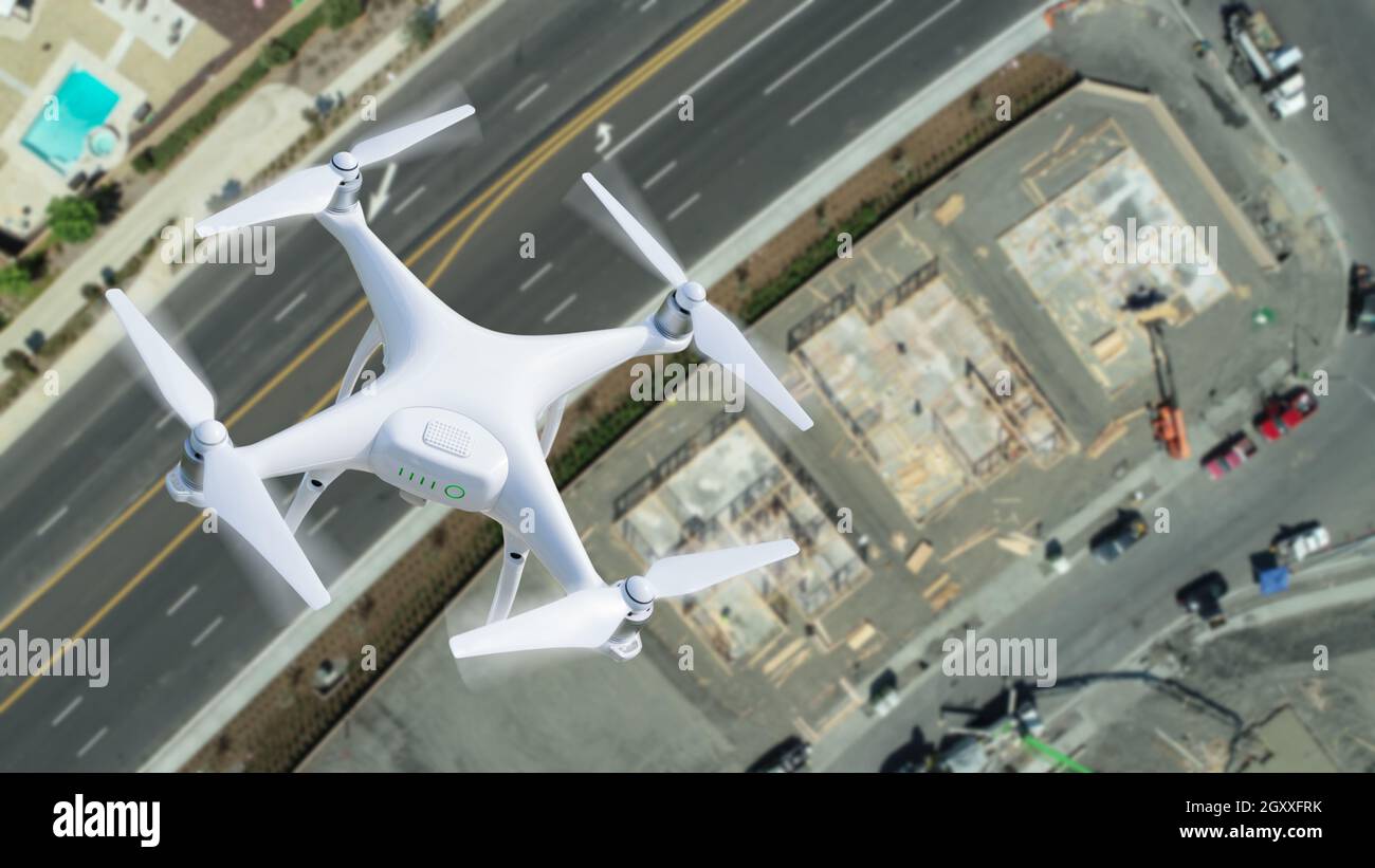 Unmanned Aircraft System (UAV) Quadcopter Drone In The Air Over ...