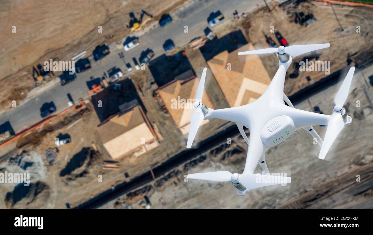 Unmanned Aircraft System (UAV) Quadcopter Drone In The Air Over ...