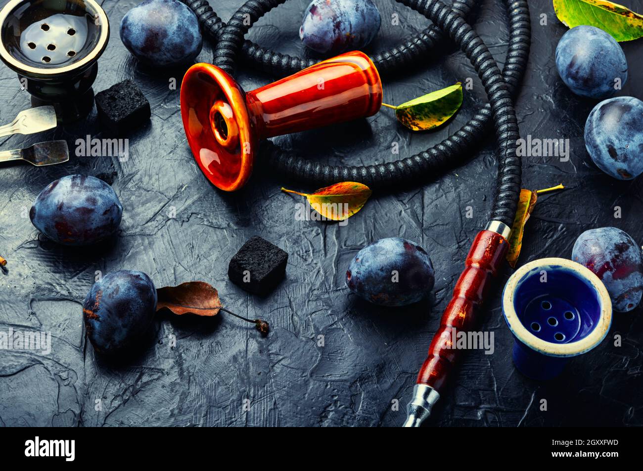 Smoking hookah with plum fragrant tobacco.Fruit shisha Stock Photo - Alamy