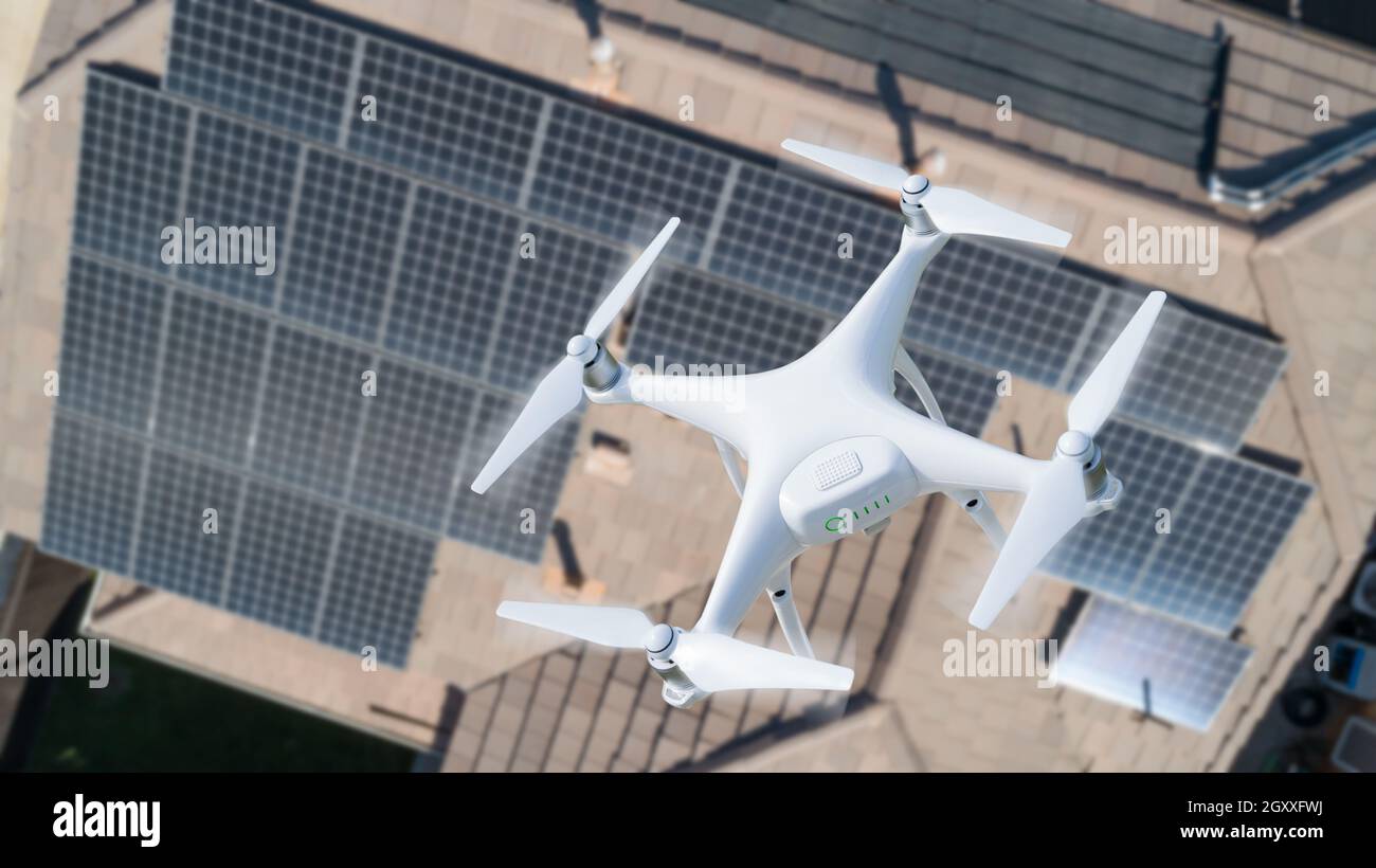 UAV Drone Inspecting Solar Panels On Large House Stock Photo - Alamy