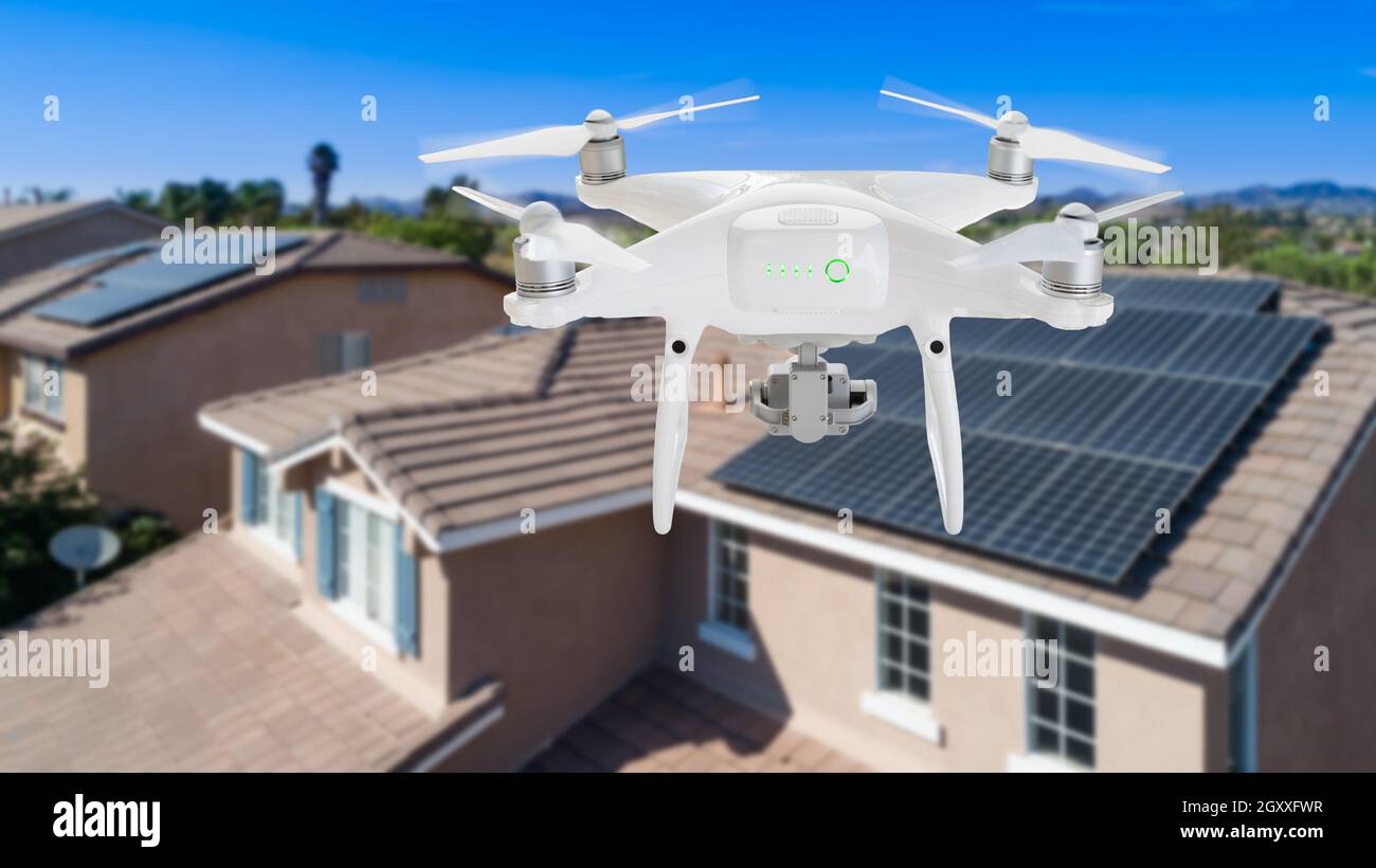UAV Drone Inspecting Solar Panels On Large House Stock Photo - Alamy